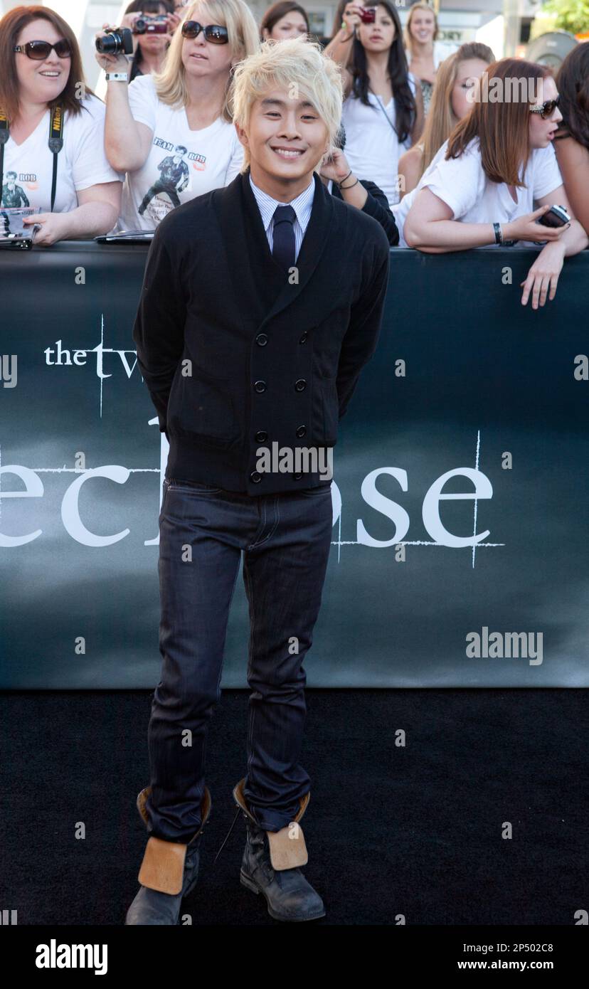 Justin Chon arrives for the Los Angeles Premiere of 'The Twilight Sage ...