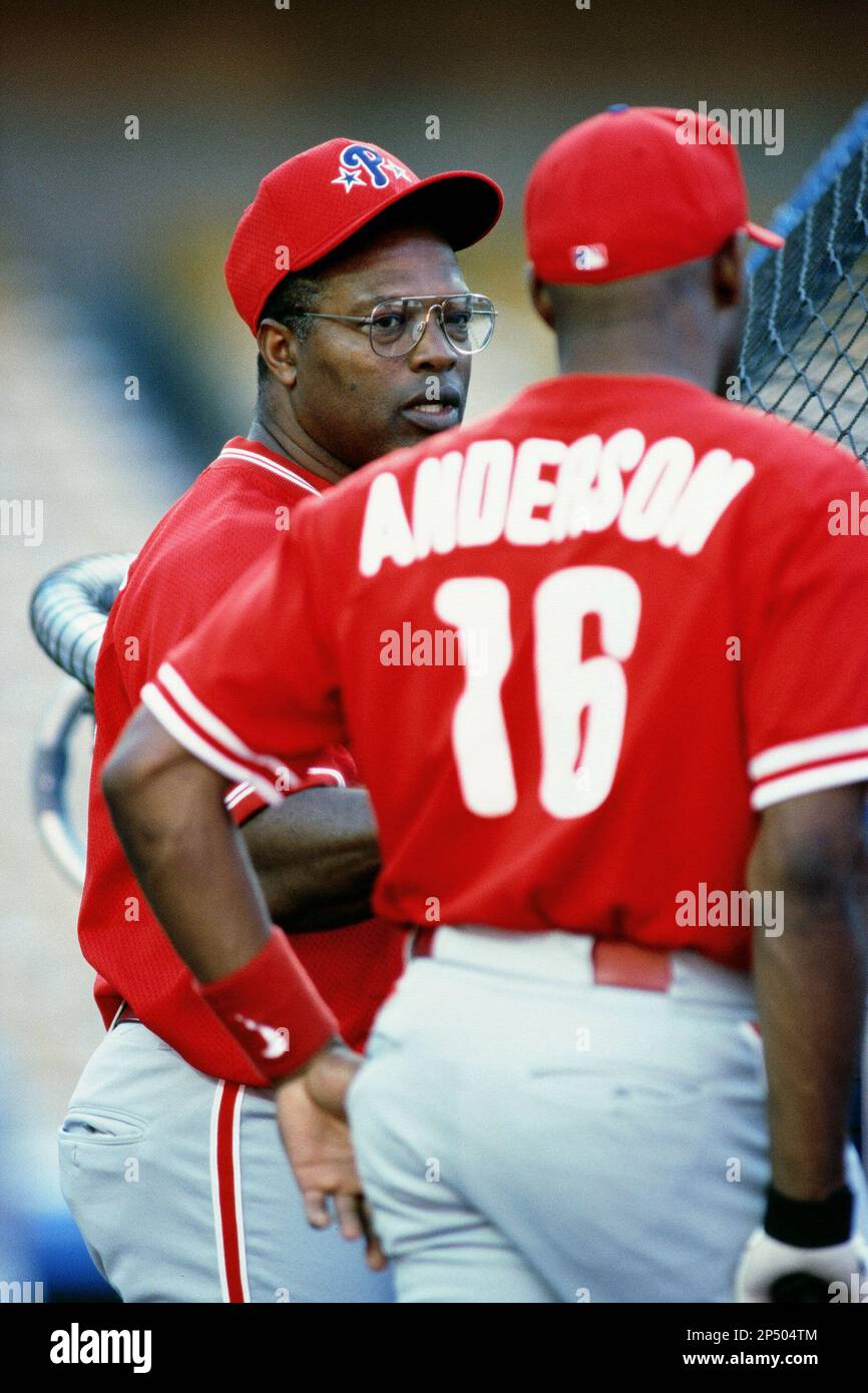 Philadelphia Phillies coach Hal McRae talks with Marlon Anderson before ...