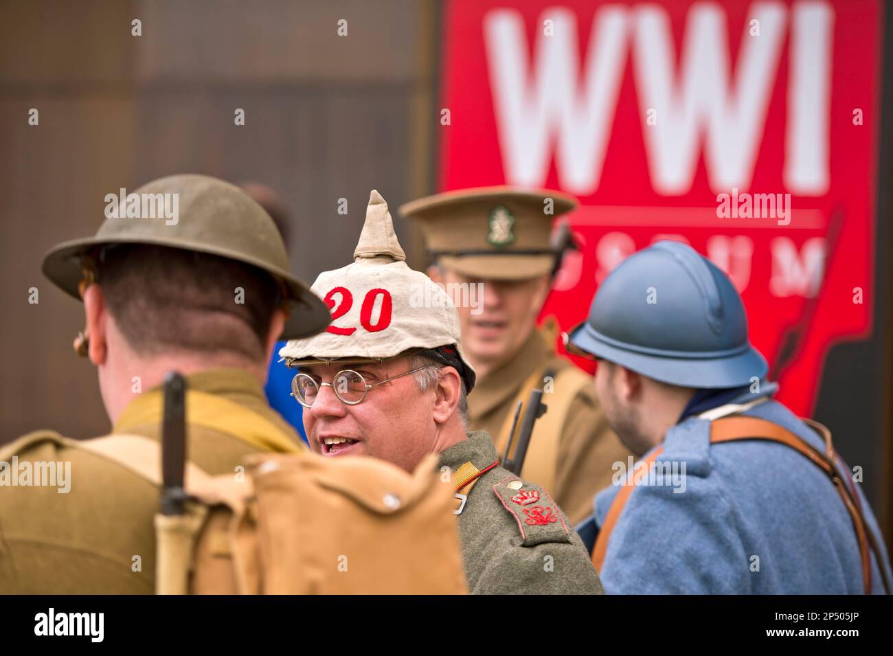 Bruce Enlow, dressed as a German soldier from 1914, spoke with other ...
