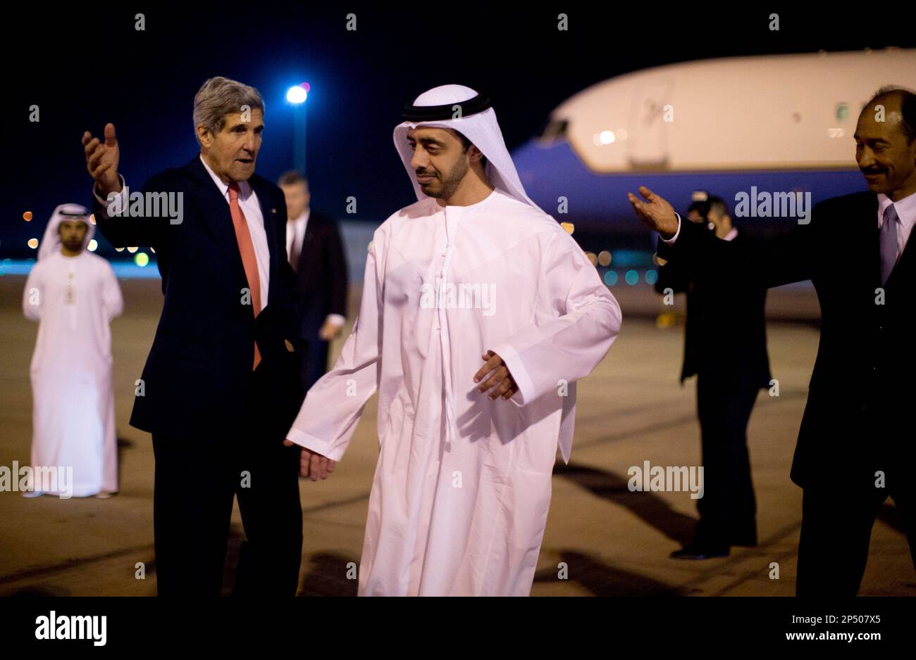 U.S. Secretary of State John Kerry, left, is greeted by United Arab ...