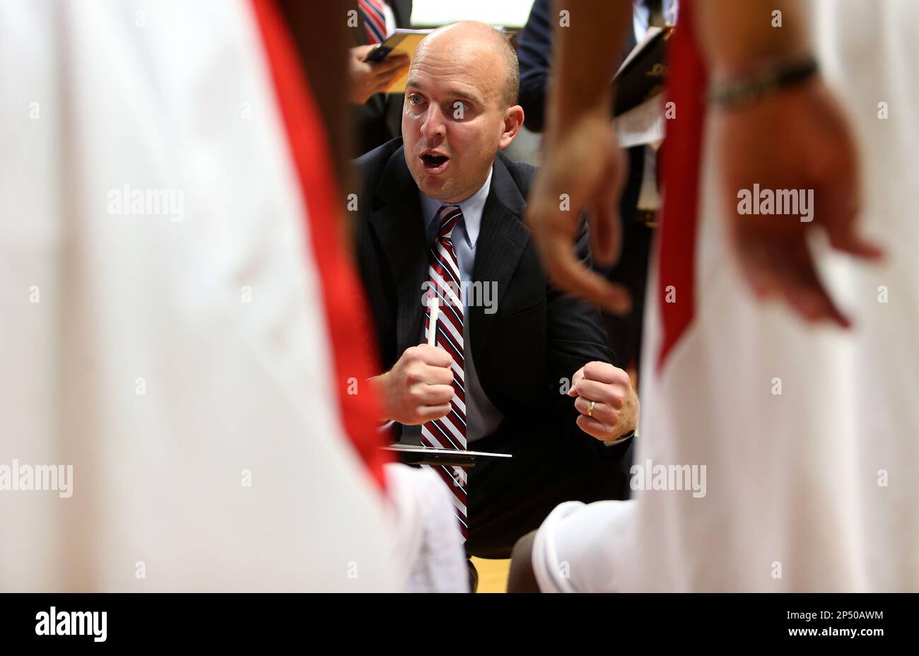 University of South Alabama's head coach Matthew Graves talks to his ...