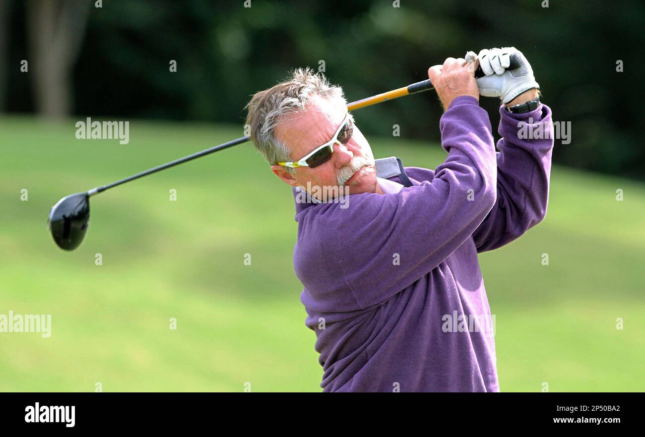 Former Houston Astros manager Phil Garner hits off the 10th tee during ...