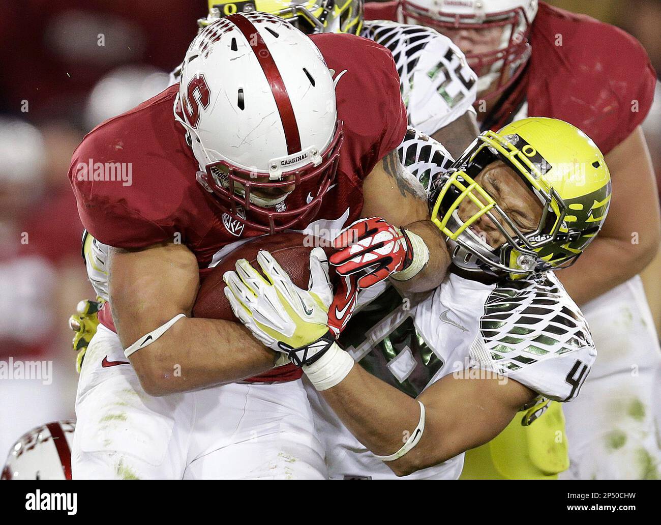 Stanford running back Tyler Gaffney, left, runs against Oregon ...