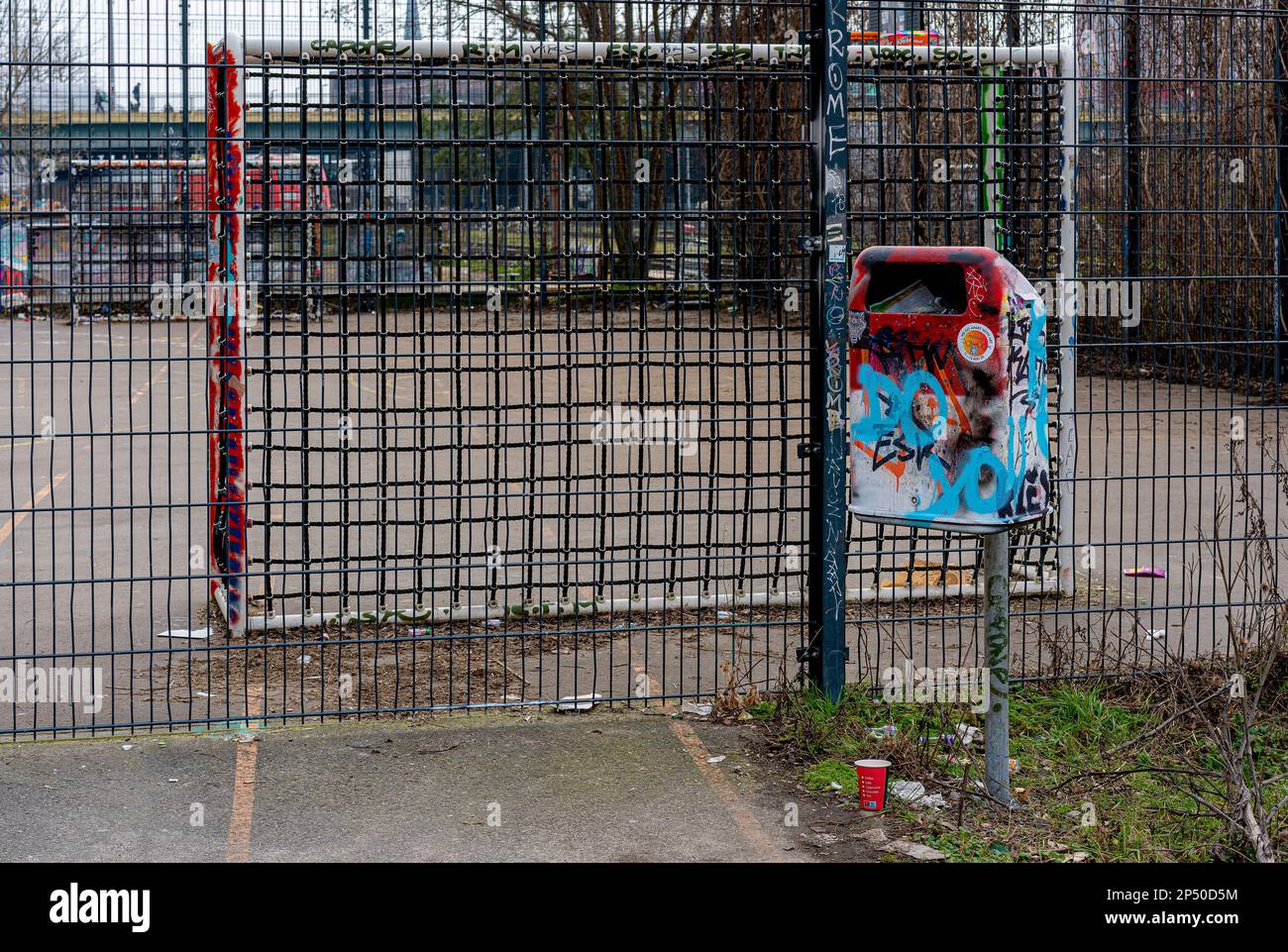 Dirty Wastebasket In Park, Wriezener Park, Berlin, Germany Stock Photo ...
