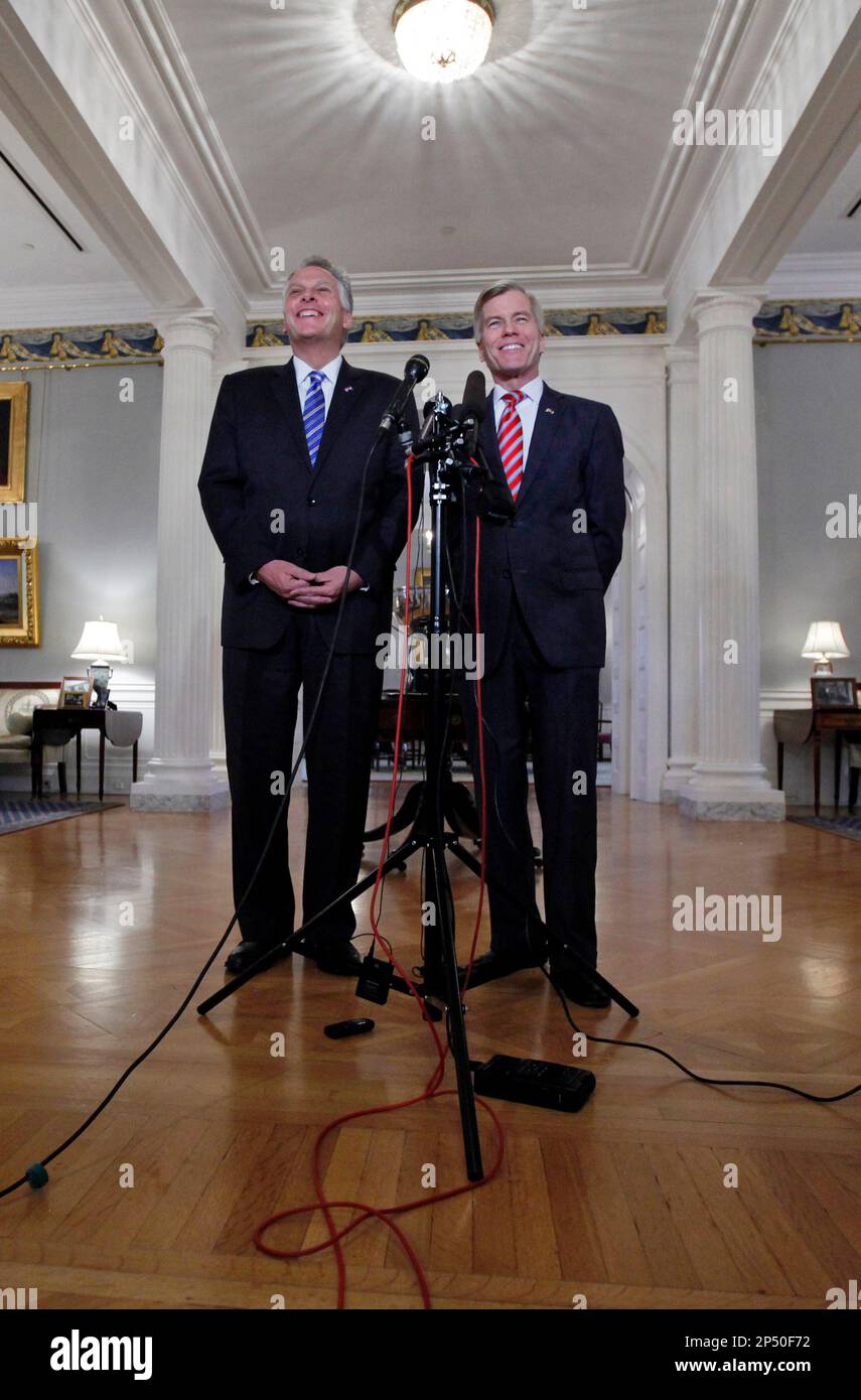 Virginia Gov.-elect Terry McAuliffe, left, and outgoing Gov. Bob ...