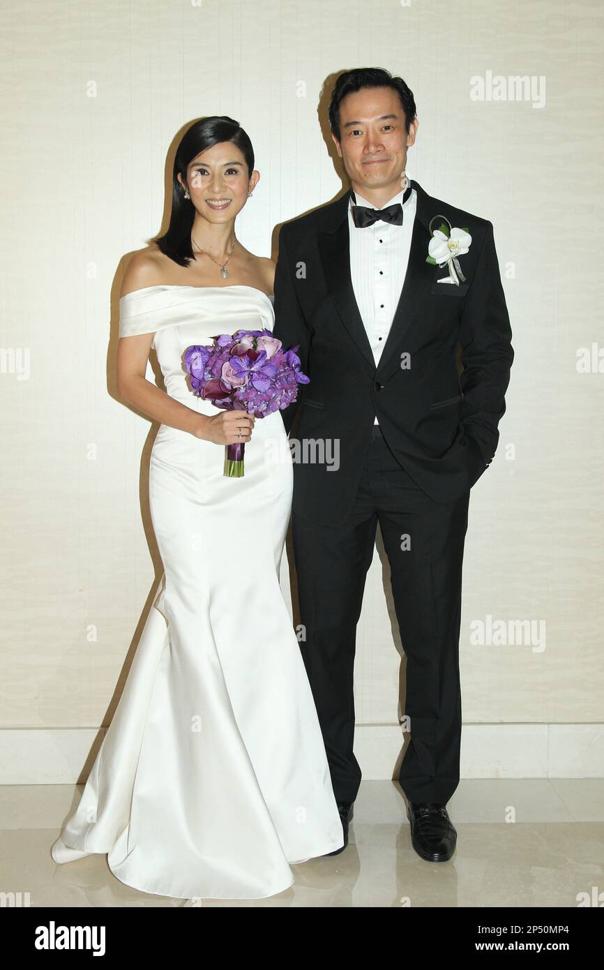 Charlie Yeung and husband Qiu Shaozhi pose for camera at their wedding ...