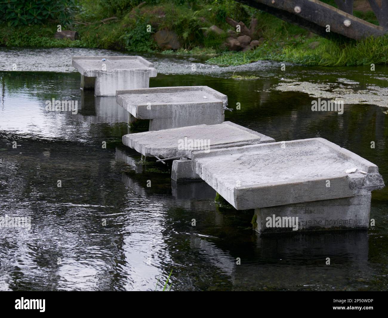 Washing in the Wild: Public Laundry Facilities in a River Stock Photo ...
