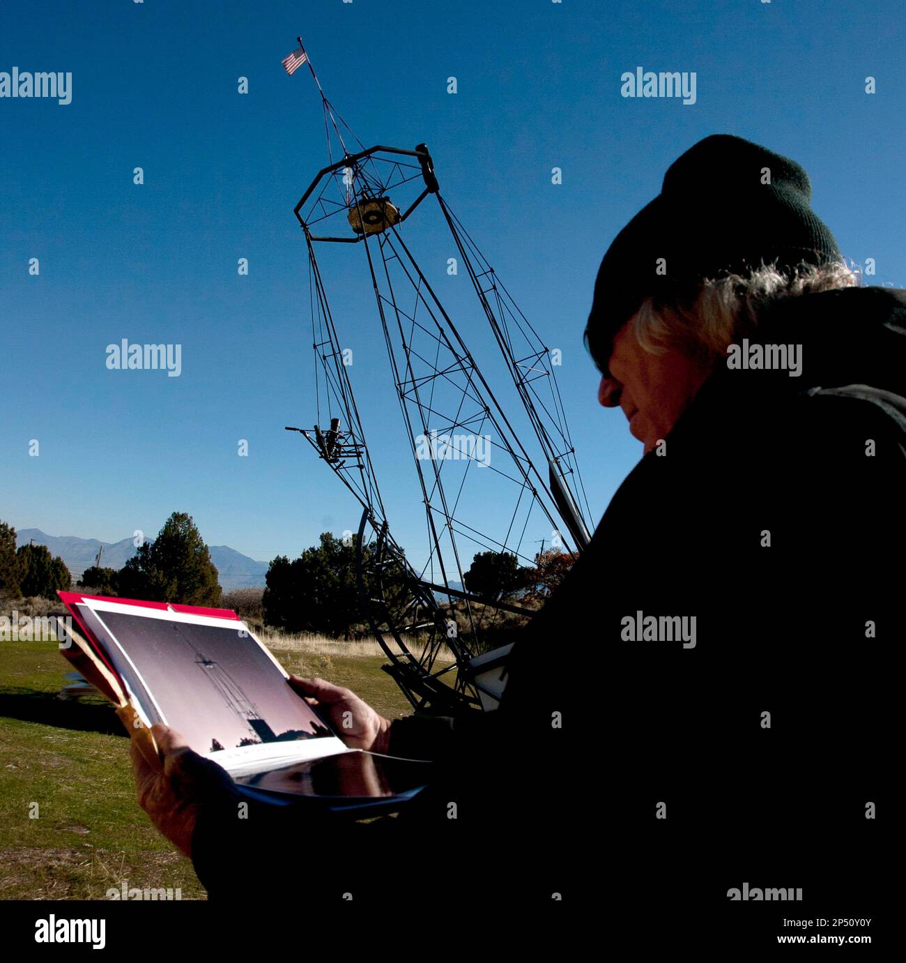 In this Oct. 27, 2013 photo, Mike Clements stand with his homemade 70 ...