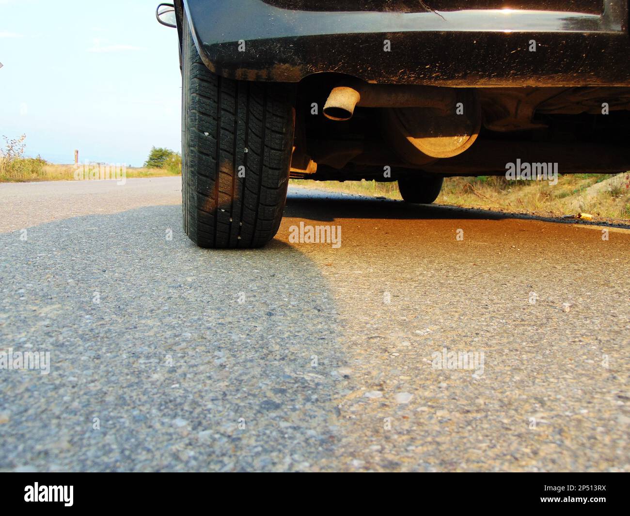 wheel of a car on the road Stock Photo - Alamy