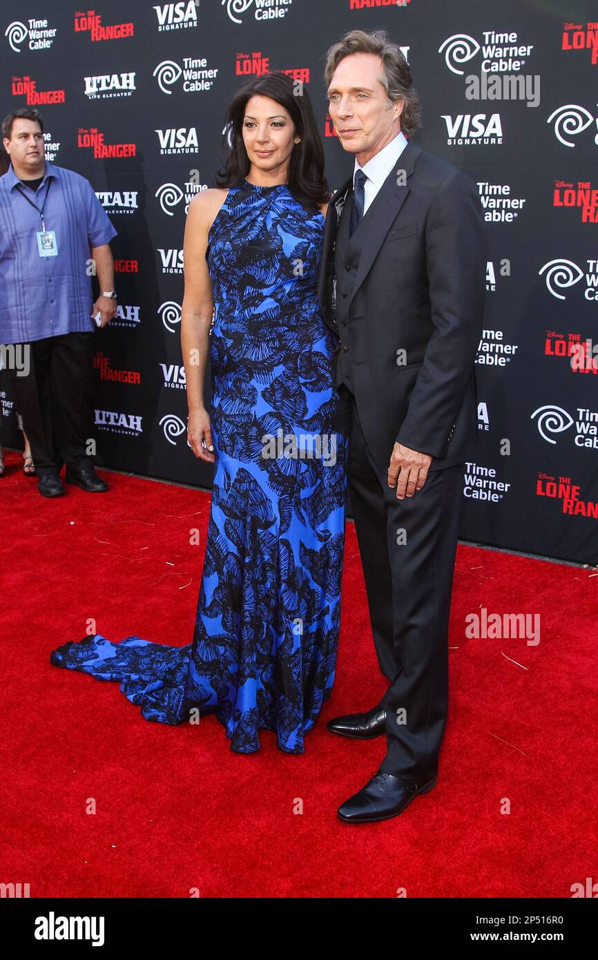 Actor William Fichtner (R) and Kymberly Kalil attend the premiere Of ...