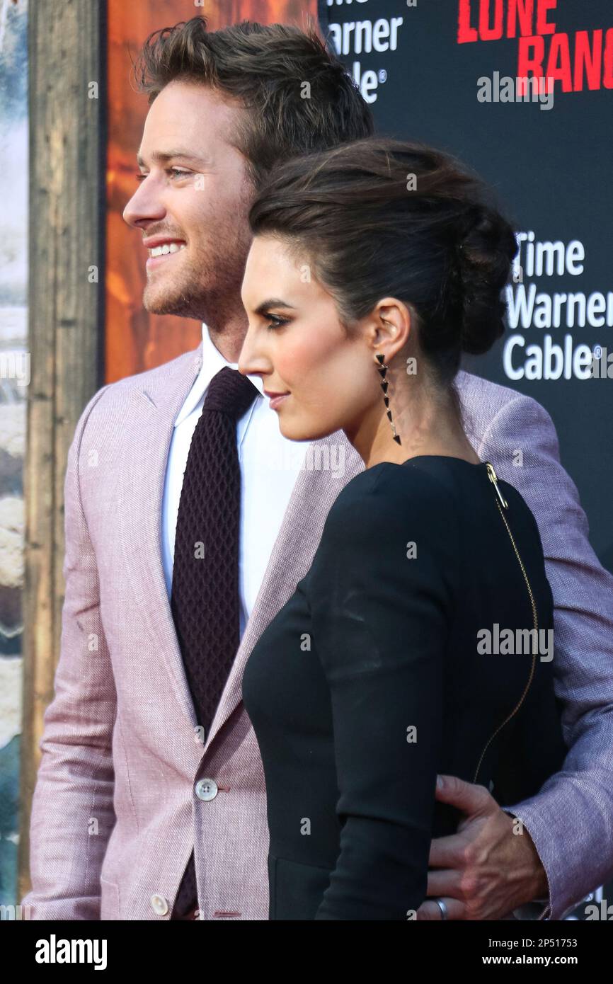 Actor Armie Hammer (L) and Elizabeth Chambers attend the premiere Of ...