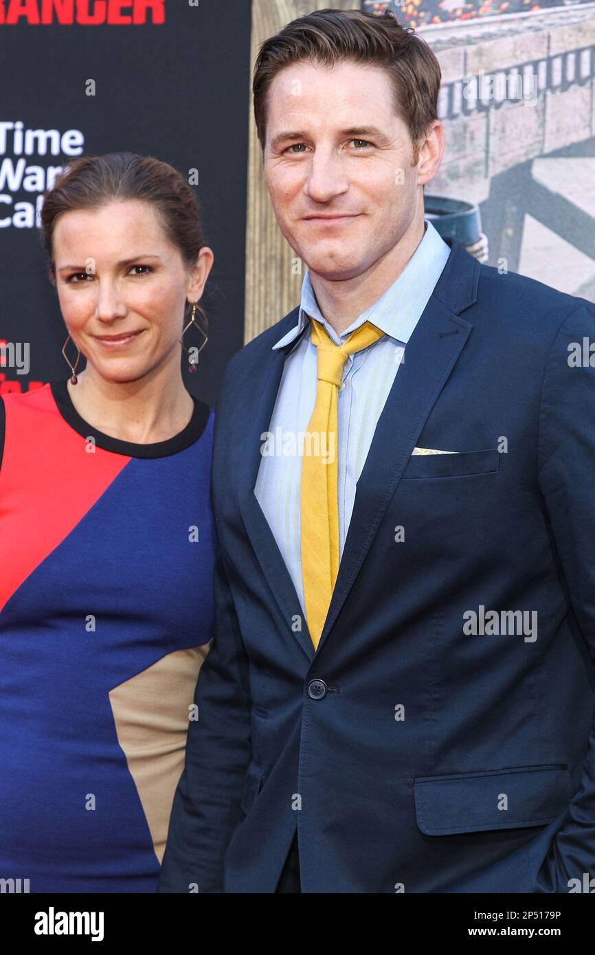 Actor Sam Jaeger (R) and Amber Jaeger attend the premiere Of Walt ...