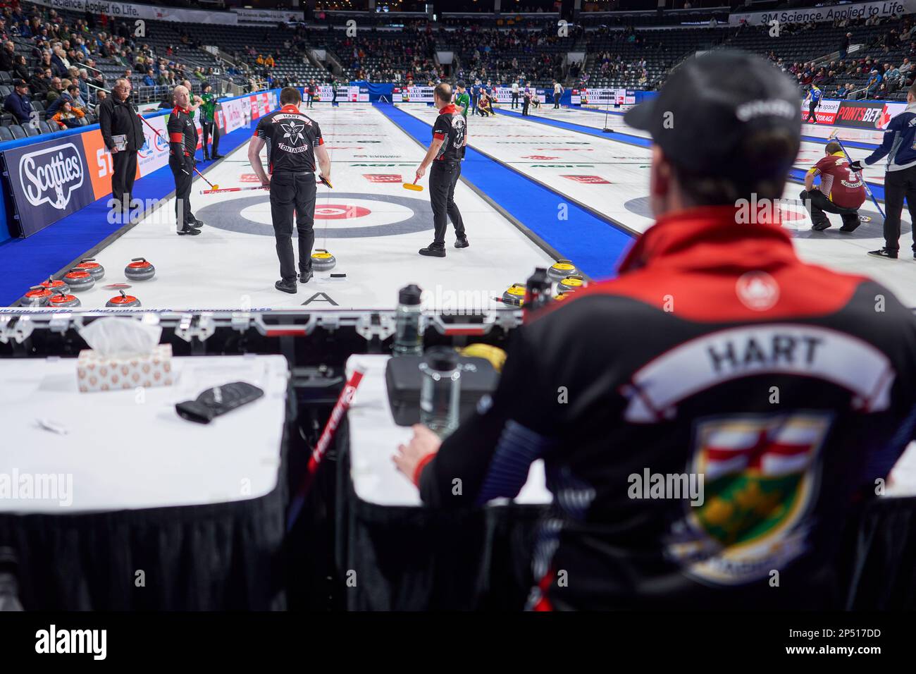 Ontario coach Richard Hart watches his son, lead Joey Hart during their ...