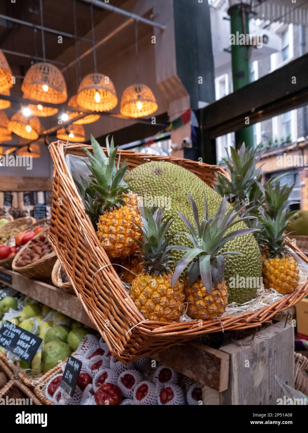 Market stall at Borough Market, London UK, partially covered urban ...