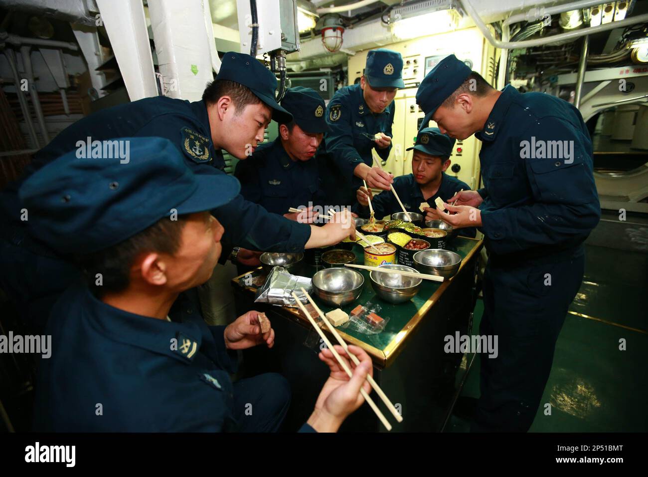 Soldiers have lunch inside a Chinese navy nuclear submarine at the ...