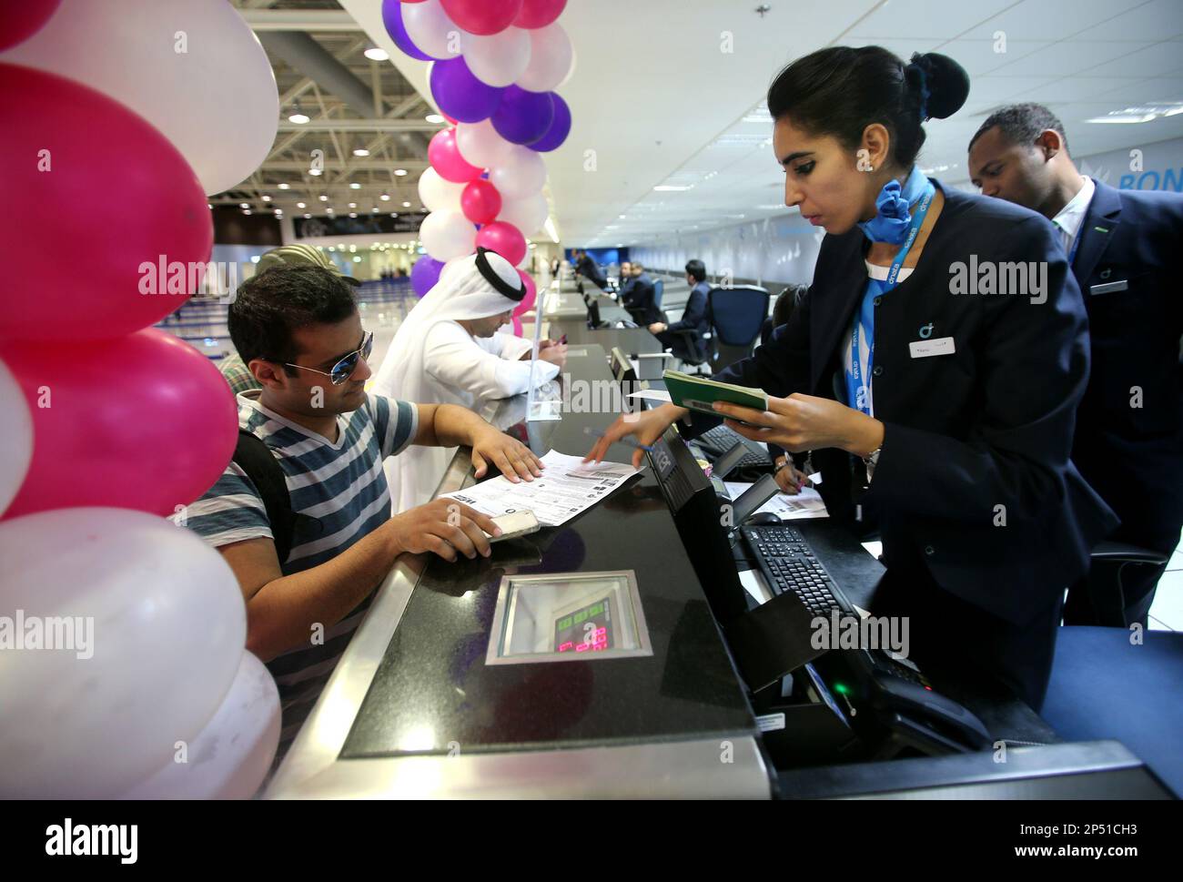 Passengers check-in at the newly opened Al Maktoum International ...