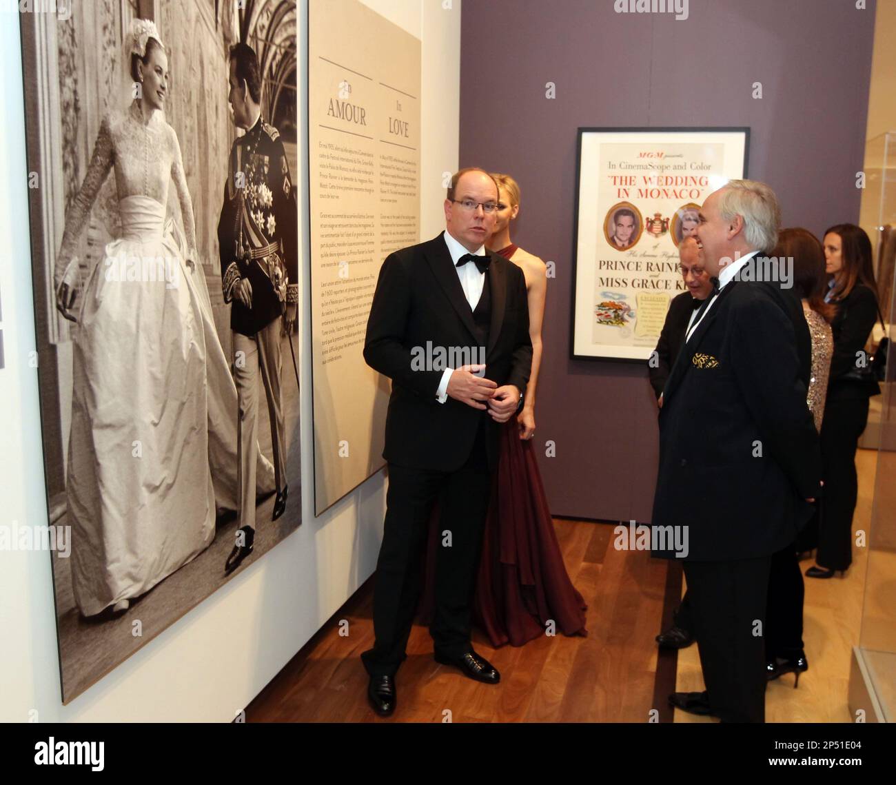 Prince Albert II of Monaco, center, walks through the Grace Kelly ...