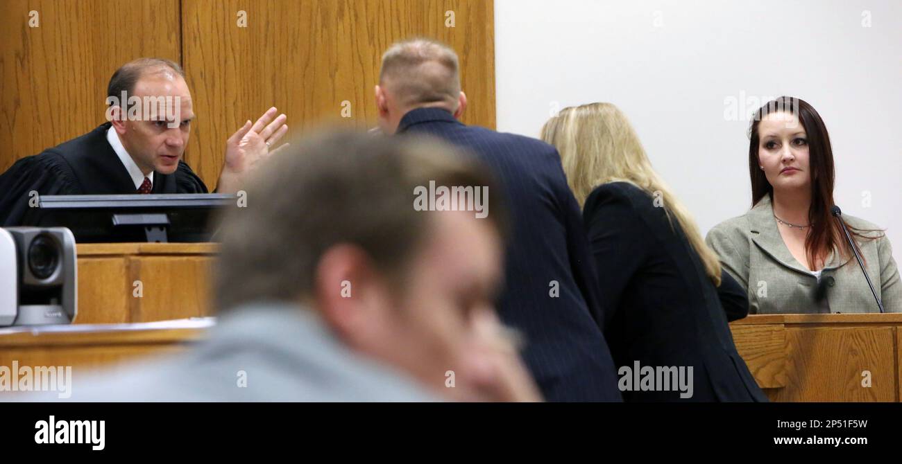 Judge Derek Pullan, left, speaks with Utah County Prosecutor Sam Peak ...