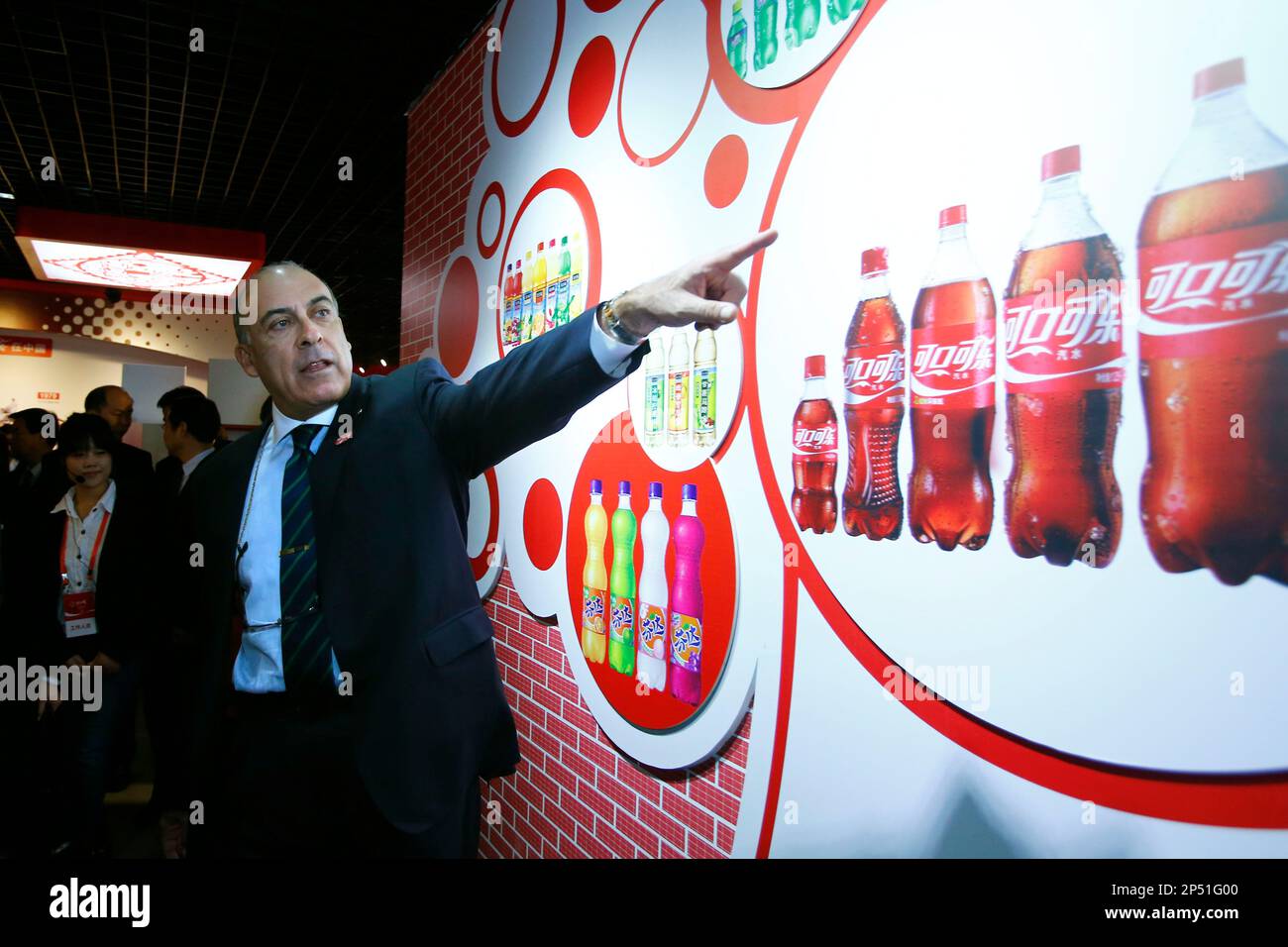 Coca-Cola Chairman and CEO Muhtar Kent (L) attends the inauguration of ...