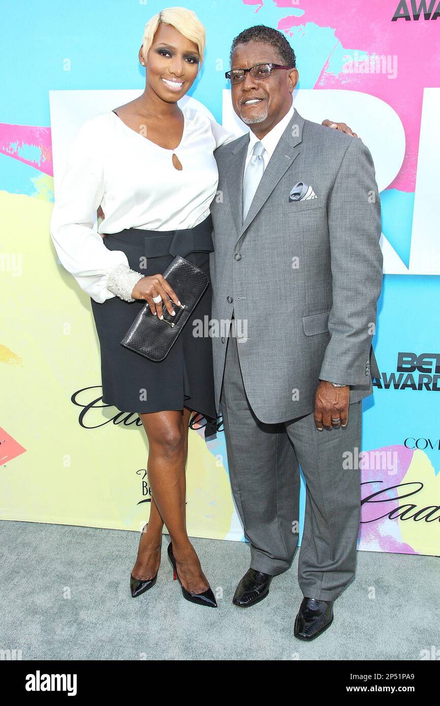 TV personality NeNe Leakes and husband Gregg Leakes attend Debra L. Lee ...