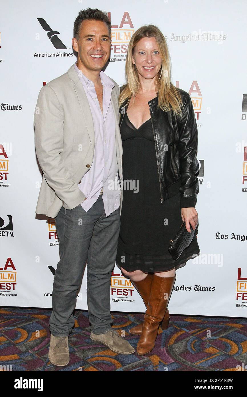 Producers Tom McNulty (L) and Michelle Krumm attend the 2013 Los Angeles Film Festival Premiere ...