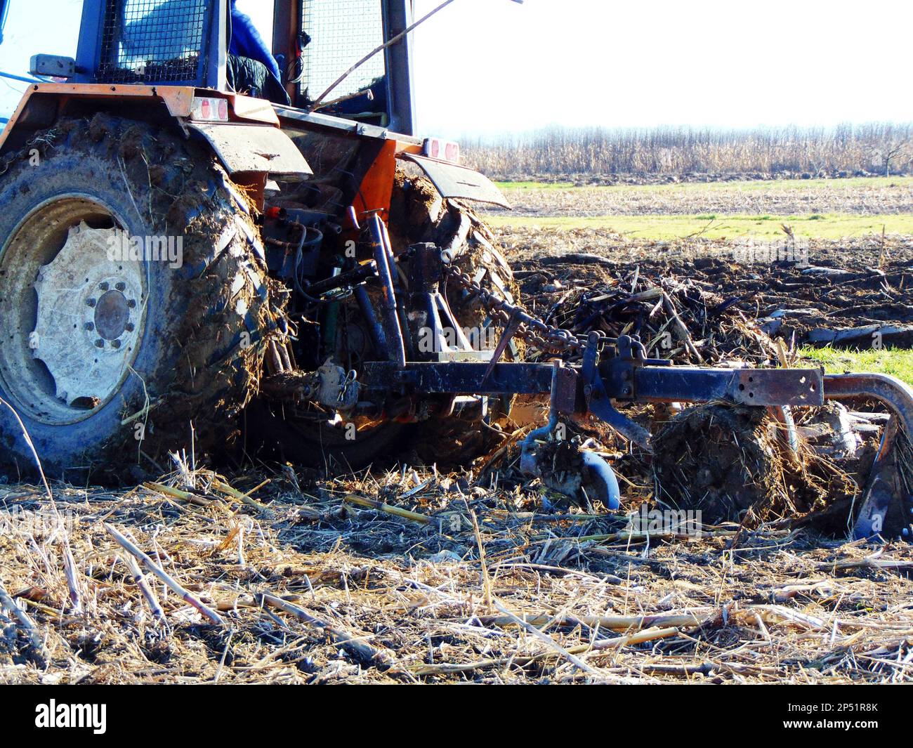 tractor on the field at farm Stock Photo - Alamy
