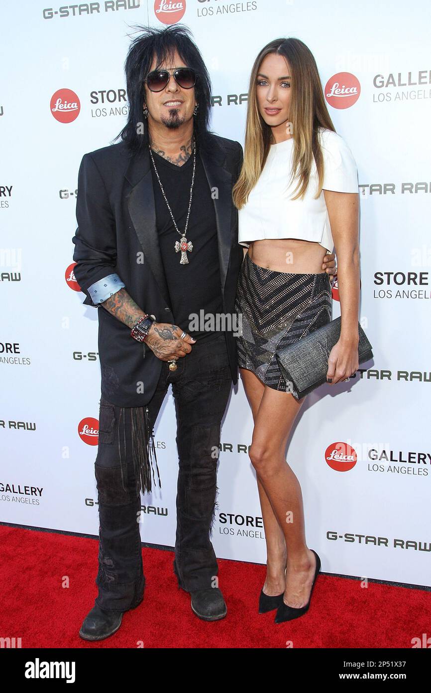 Musician Nikki Sixx (L) and Courtney Bingham attends the Leica Store ...