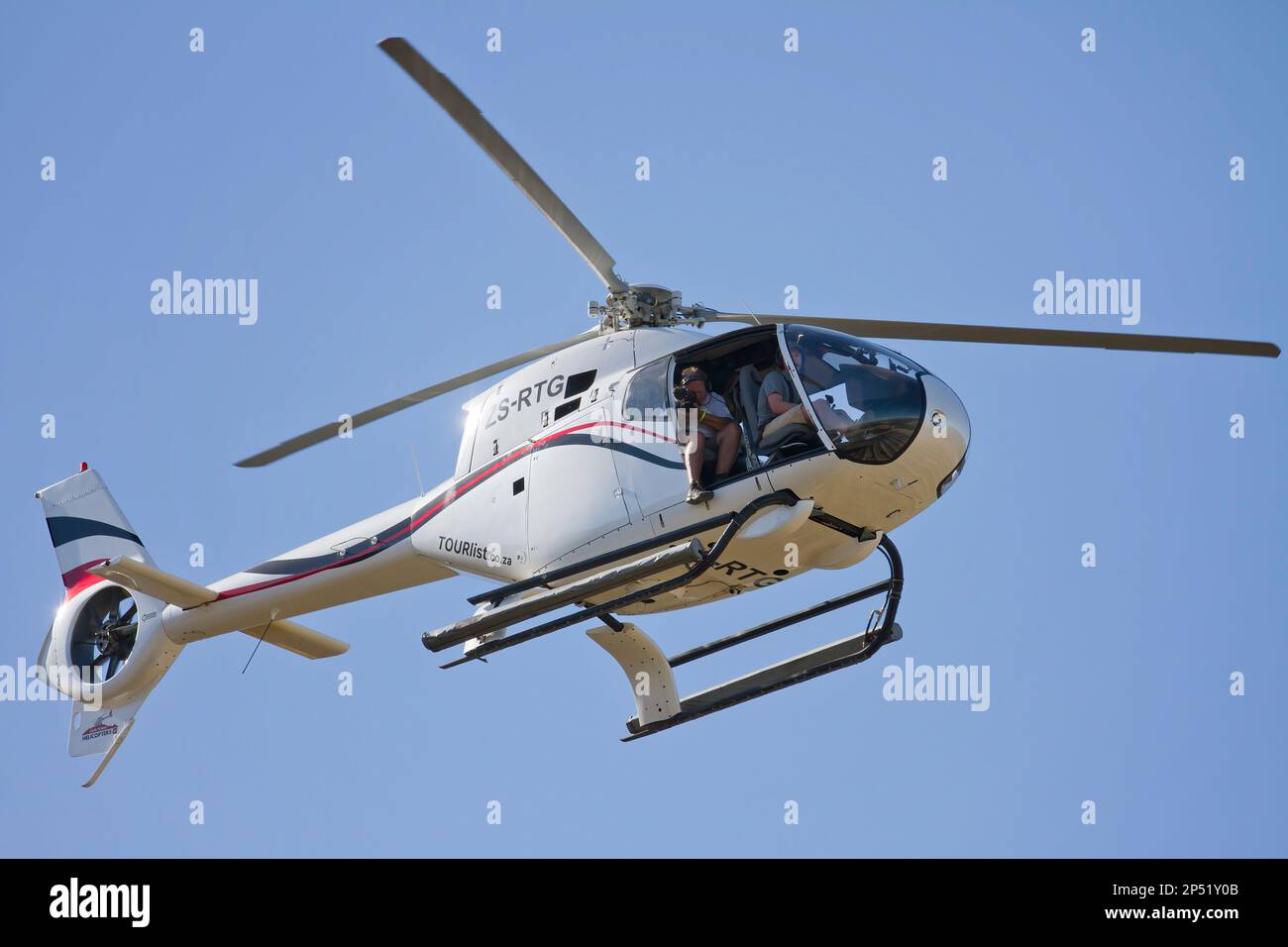 Helicopter crew filming riders at the ABSA Cape Epic Stock Photo - Alamy