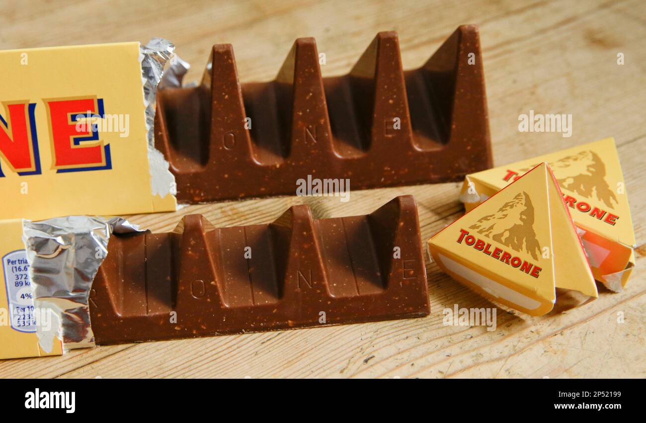 Two bars of the Toblerone Swiss chocolate are shown, at front is the ...