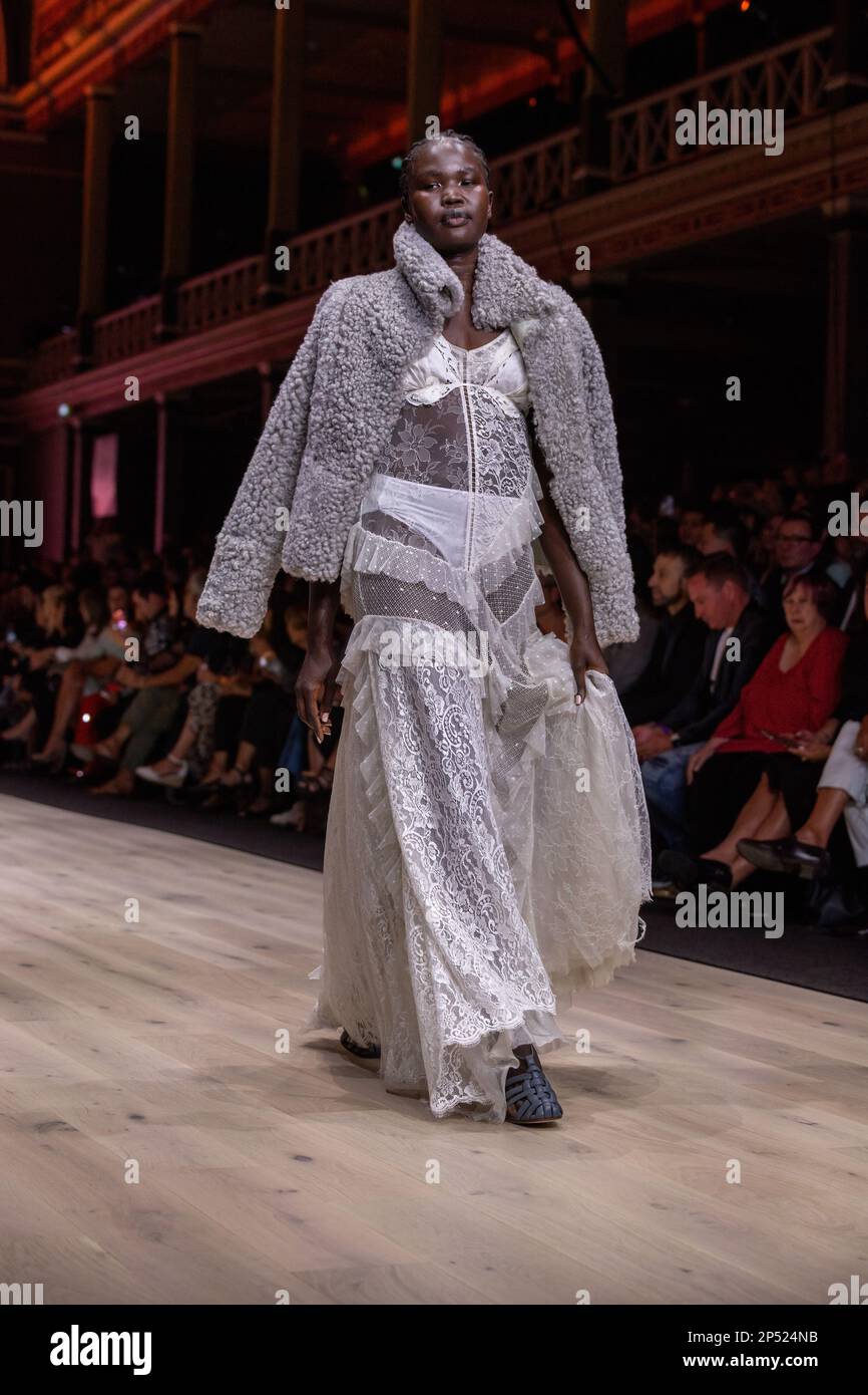 A model dressed by Nevenka walks the runway at the Utopia runway show ...