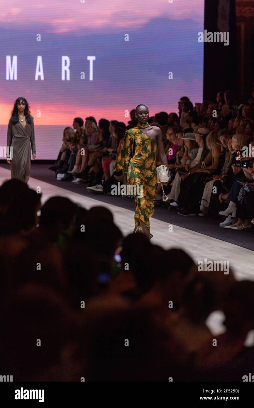 A model dressed by Ginger & Smart walks the runway at the Utopia runway ...