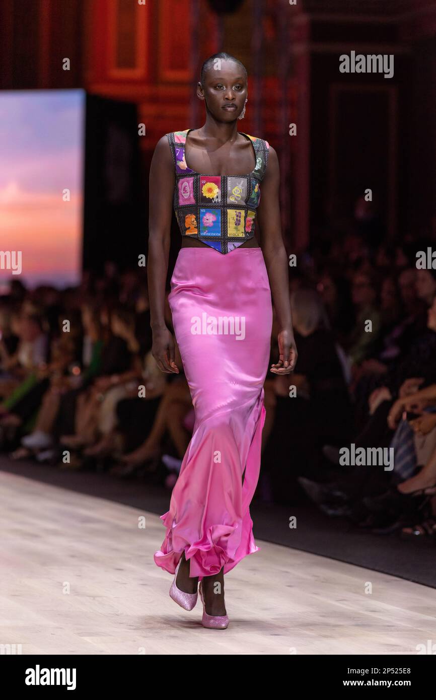 A model dressed by Van Der Kooij walks the runway at the Utopia runway ...