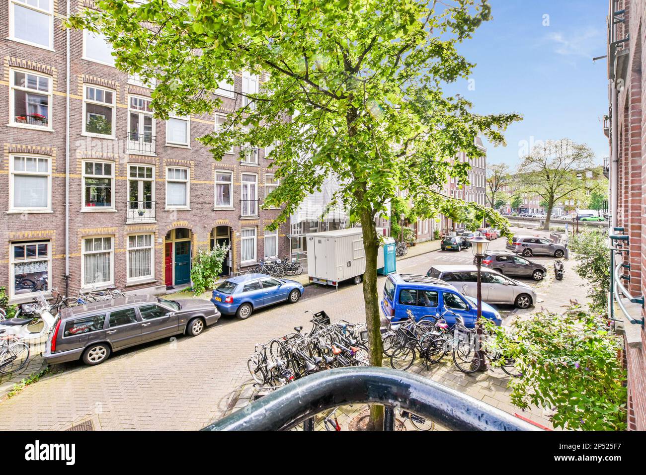 Amsterdam, Netherlands - 10 April, 2021: an urban street with parked ...