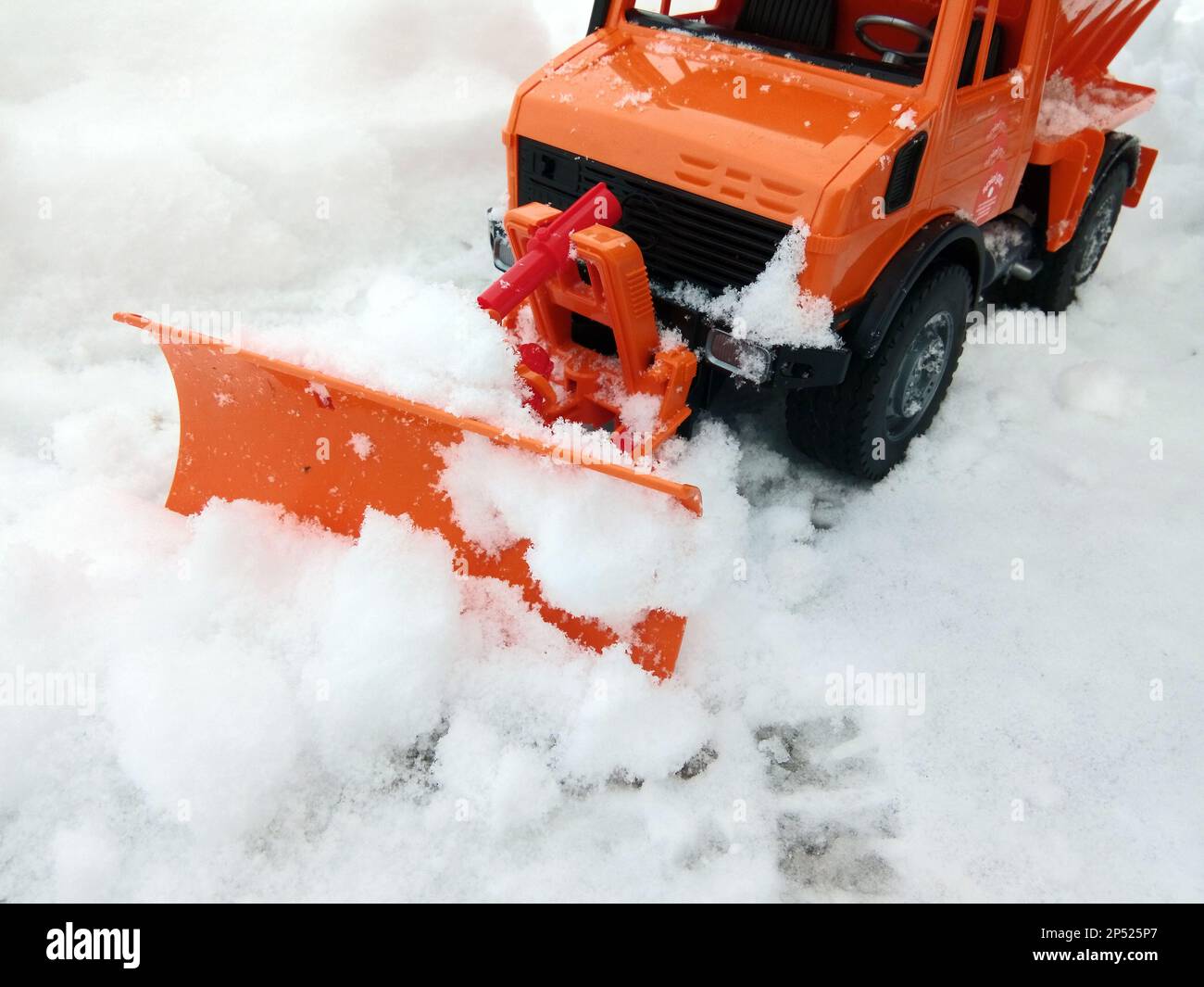 a blade pushes the snow Stock Photo - Alamy