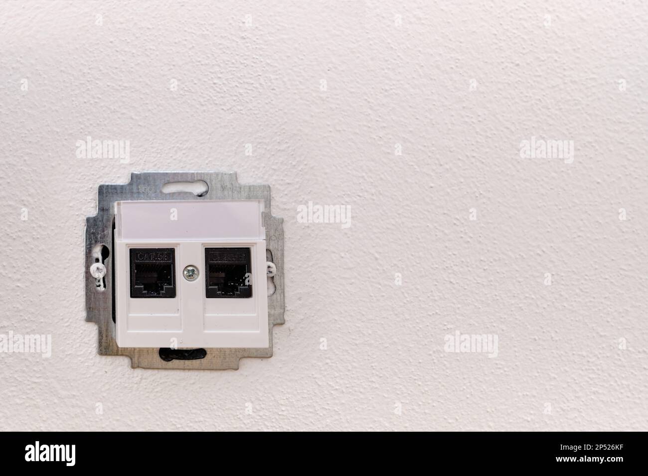 Installing or repairing on-wall internet network socket for a computer ...