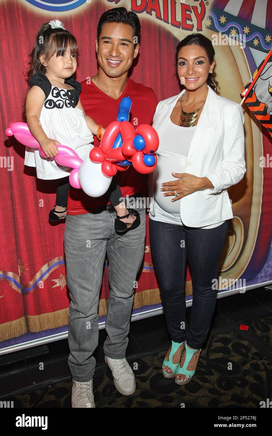 Mario Lopez , wife Courtney Lopez and daughter Gia attend the premiere ...