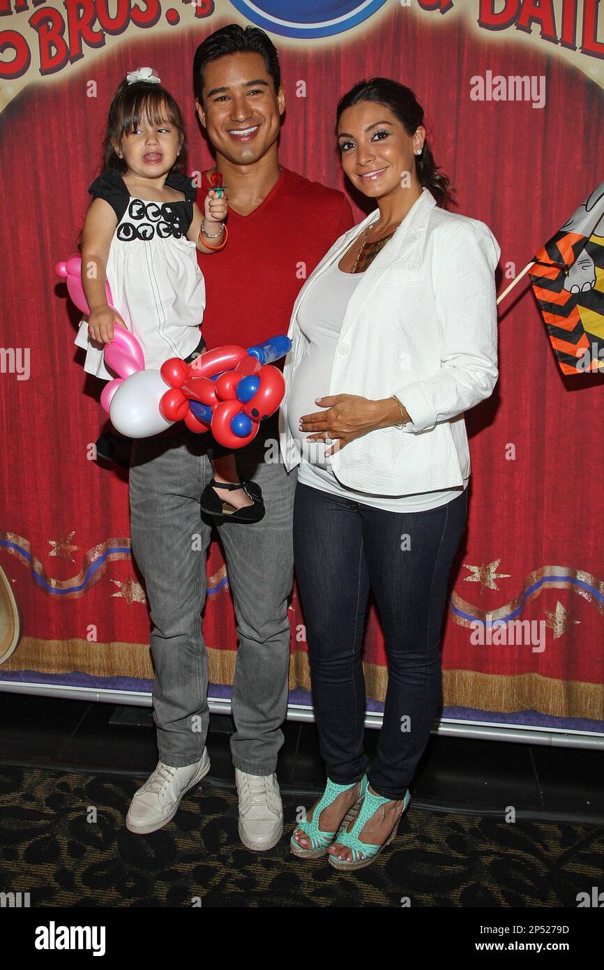 Mario Lopez , wife Courtney Lopez and daughter Gia attend the premiere ...