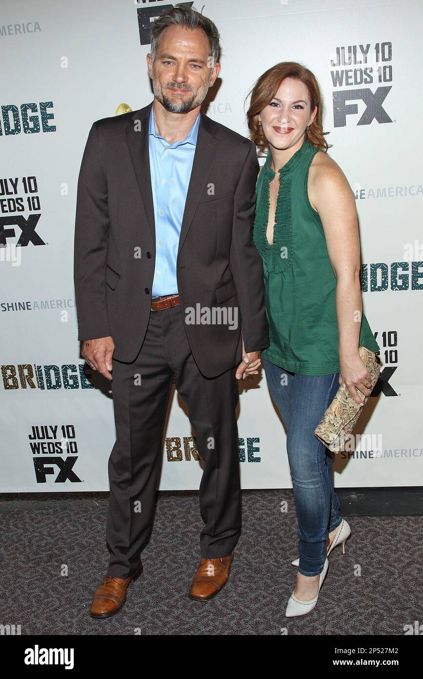 Actor David Meunier (L) and actress/wife Faline England attend the ...