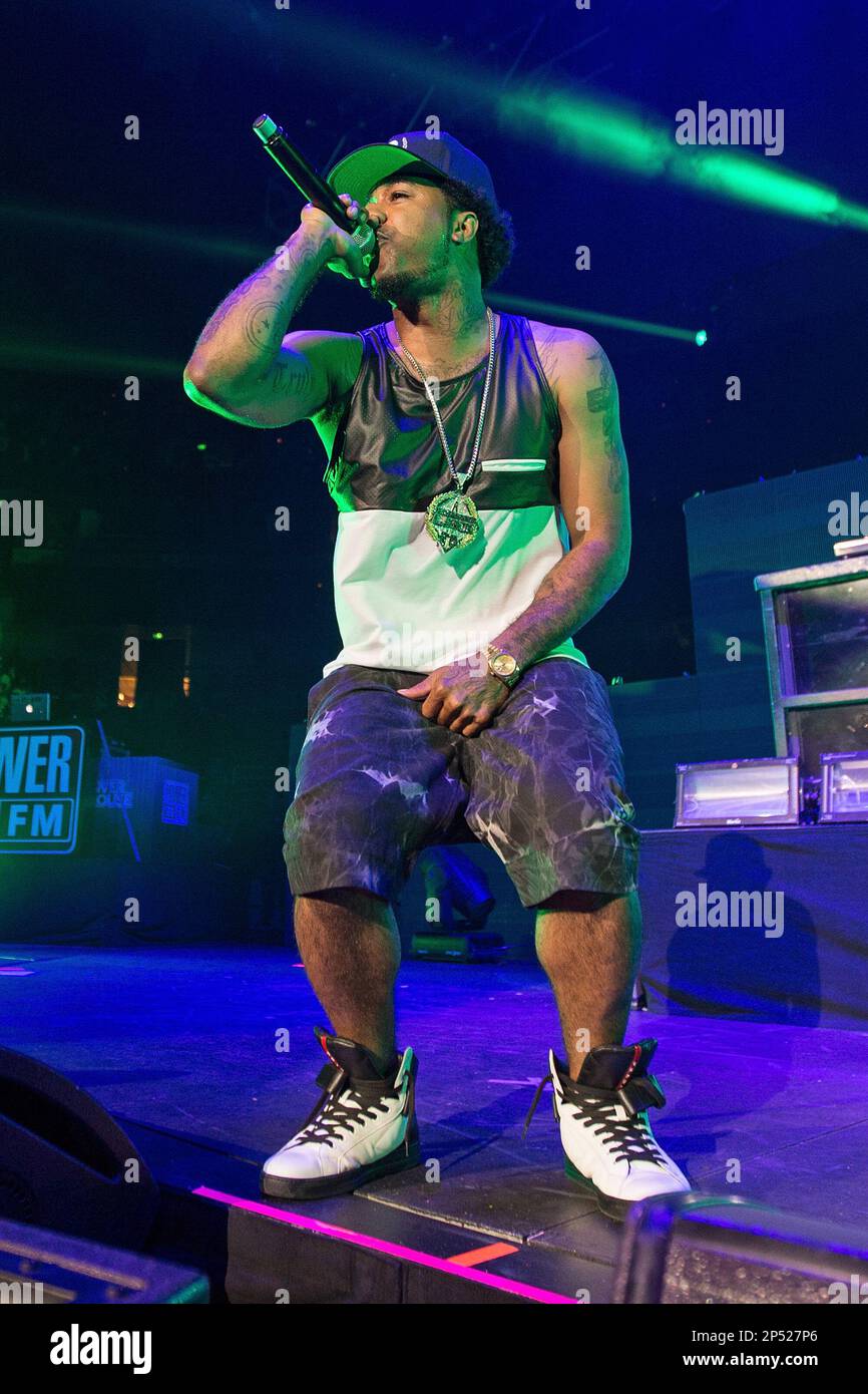 Singer Problem performs on stage during Powerhouse 2013 at Honda Center ...