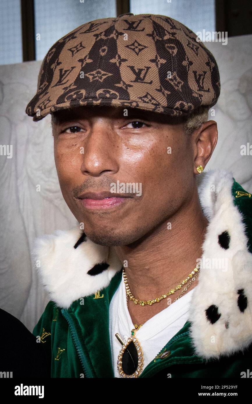 Pharrell Williams poses for photographers following to the Louis ...