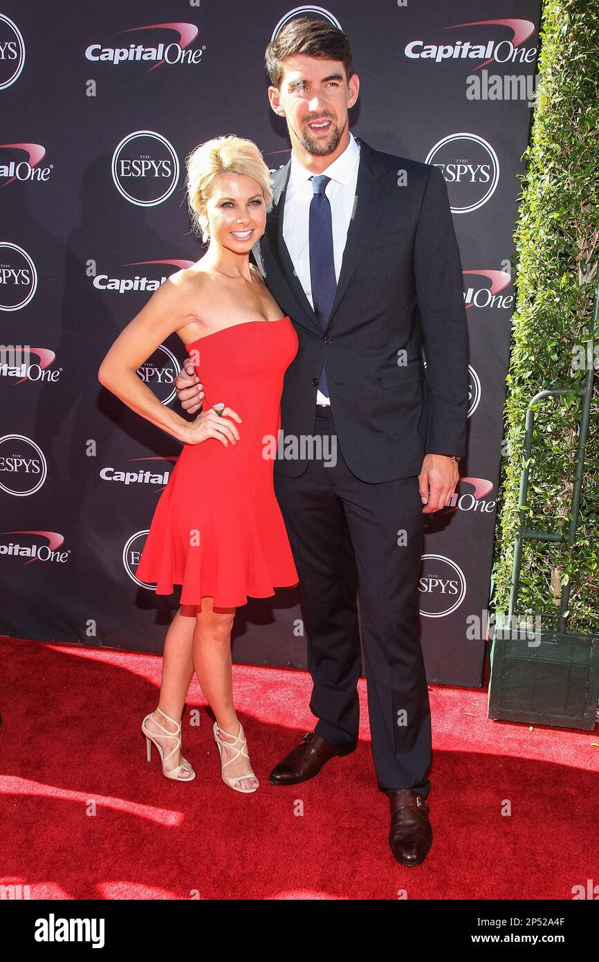 Olympic swimmer Michael Phelps and Golf Channel reporter Win McMurry ...
