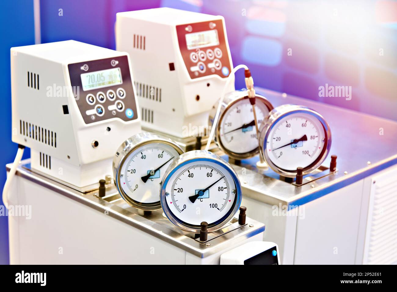 Digital and analog displays of temperature in chemical Stock Photo - Alamy
