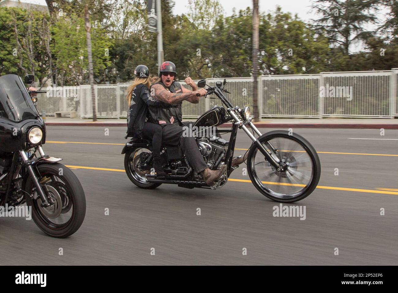Rusty Coones (R) of Illusion Motorsports and Attika 7 leads a ...