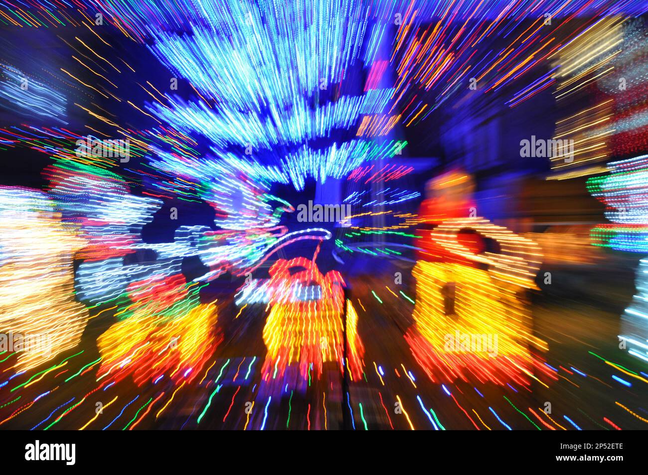 Zoom burst photo of Christmas Lights in a suburban garden, UK Stock ...