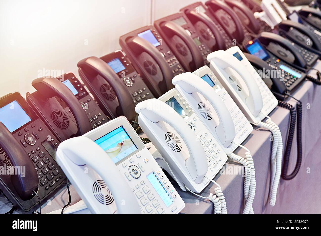 Office phones at the exhibition Stock Photo - Alamy