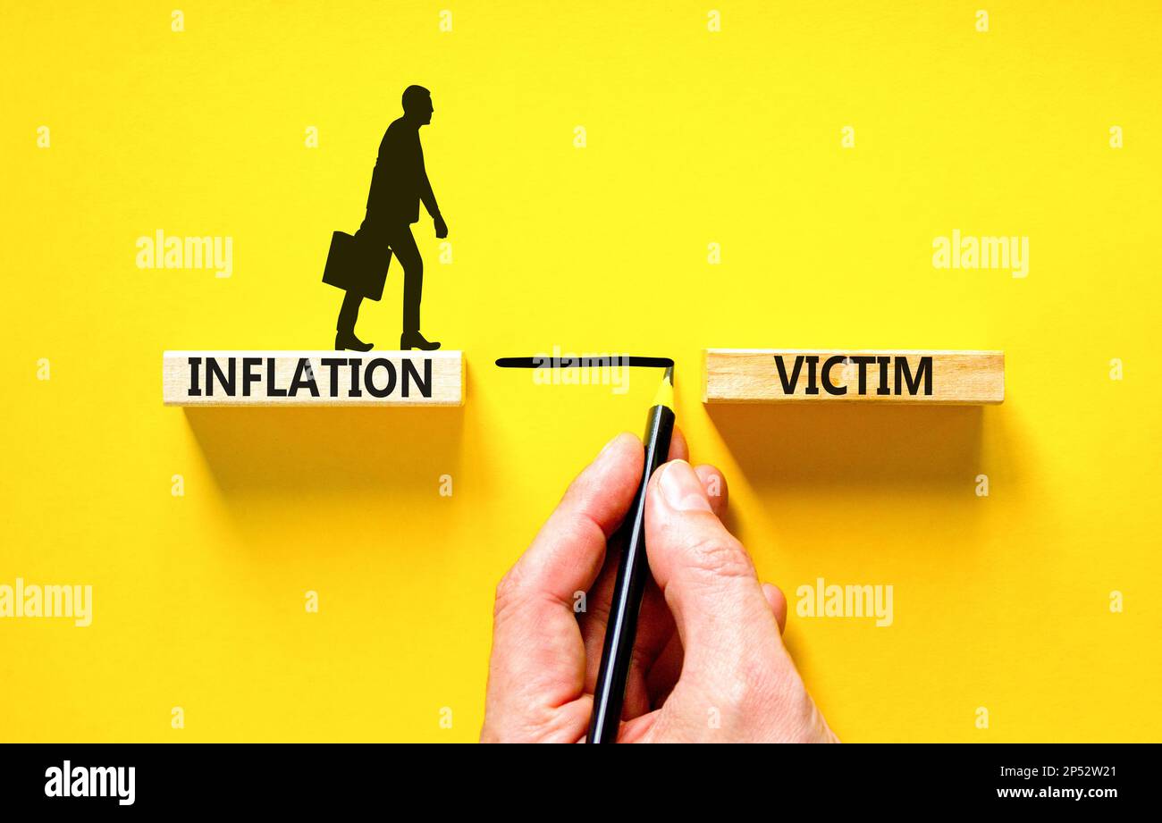 Inflation victim symbol. Concept words Inflation victim on wooden block ...