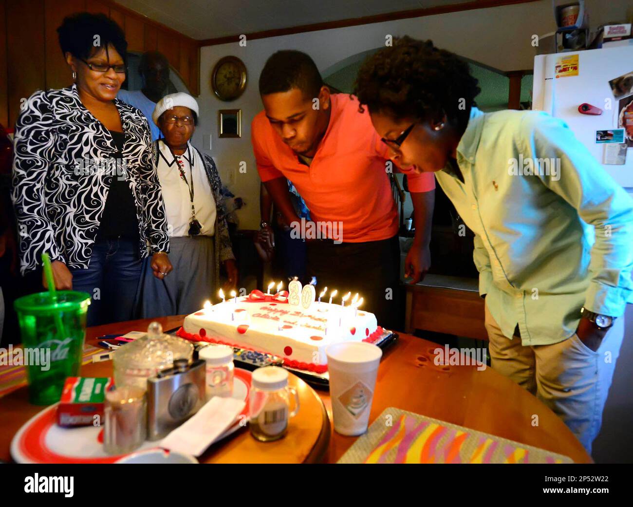 ADVANCE FOR MONDAY OCT. 14 - Twins David and Olivia Davis blow out ...