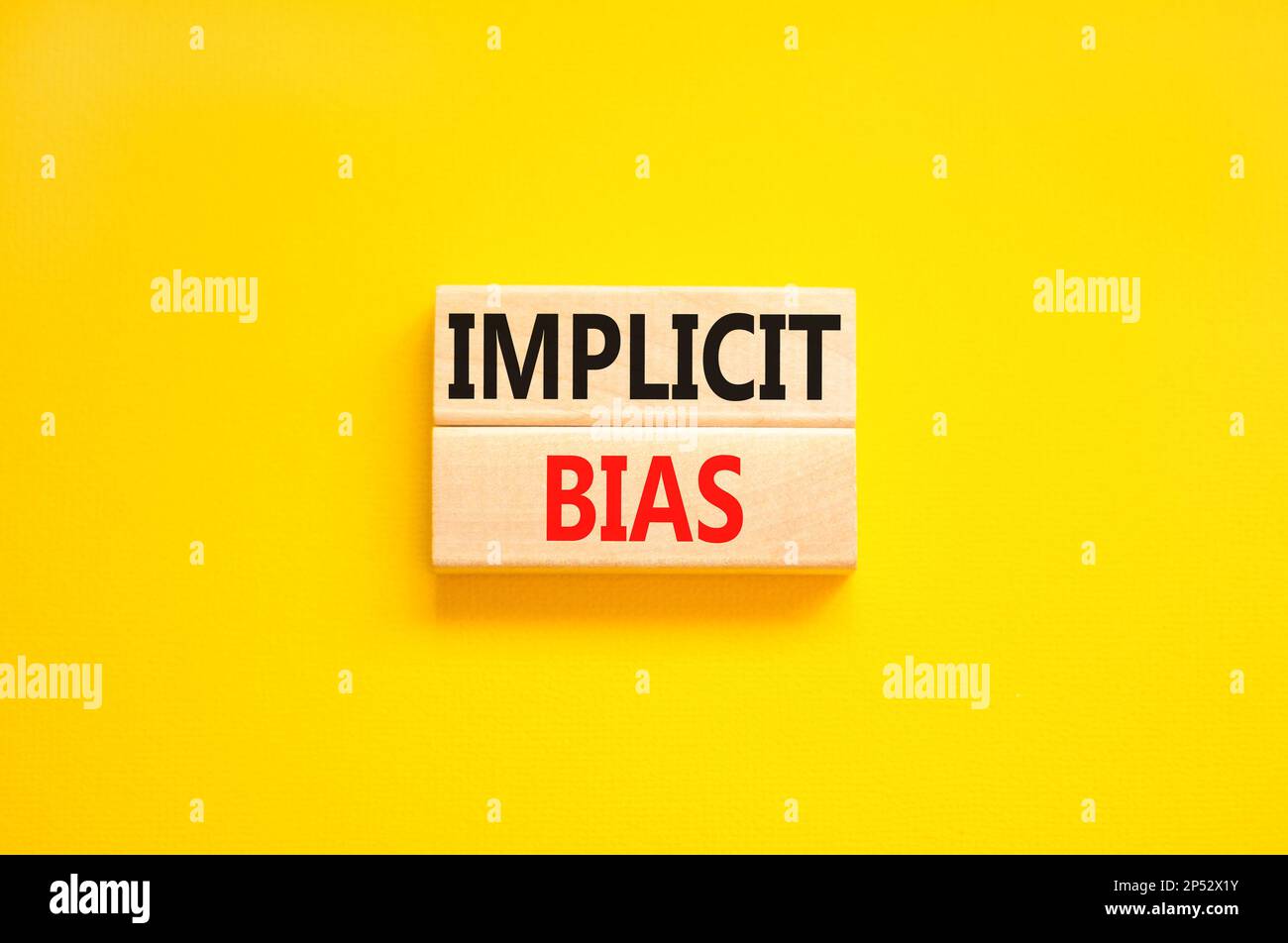 Implicit bias symbol. Concept words Implicit bias on wooden block ...