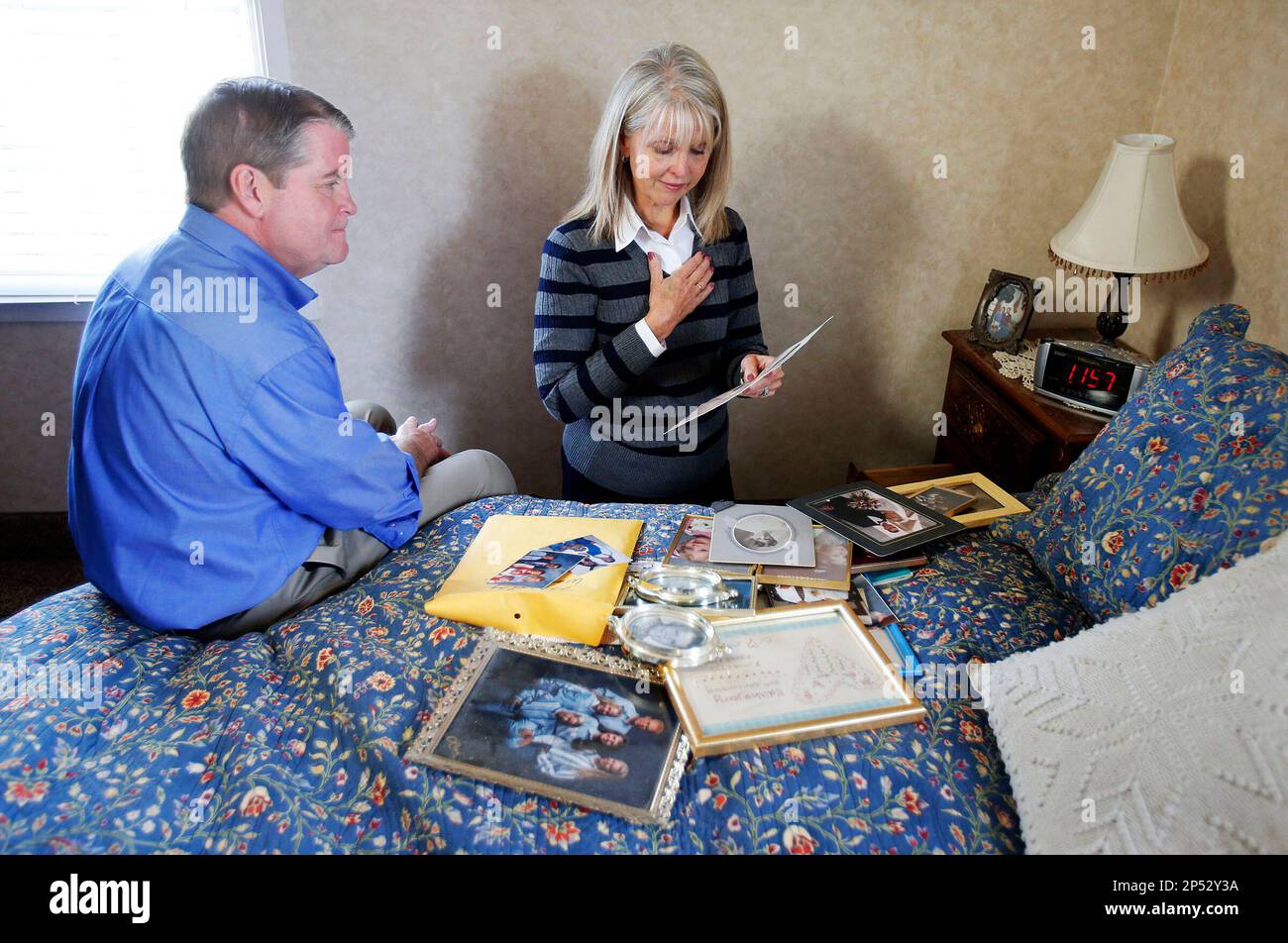 Donald Dunn and Deanna Golden go through drawers of photos in their ...