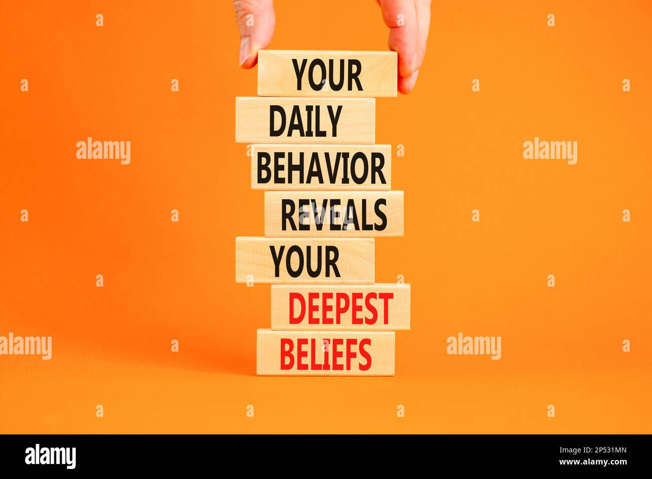 Behavior symbol. Concept words Your daily behavior reveals your deepest ...
